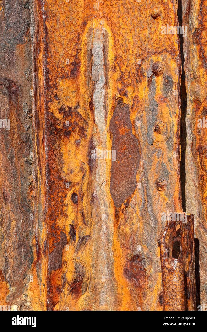 Rusty background texture close up of old distressed weathered iron ...
