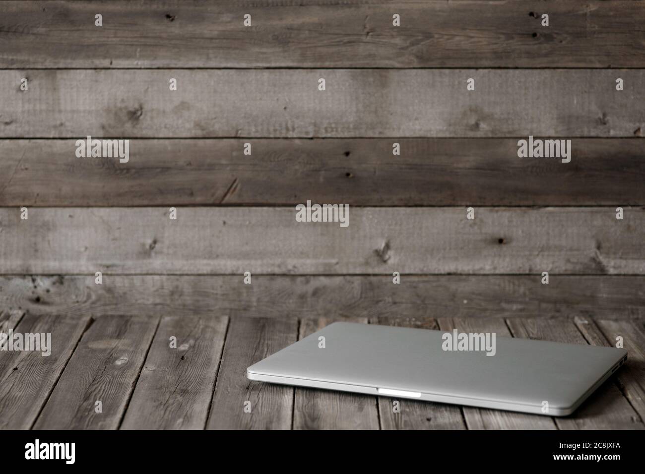 Mock up of blank laptop on the desk. Personal laptop computer on wood ...