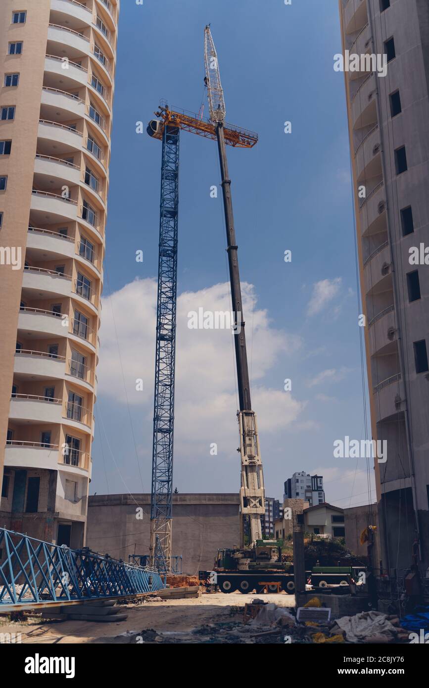 Construction work site. Making construction crane Stock Photo - Alamy