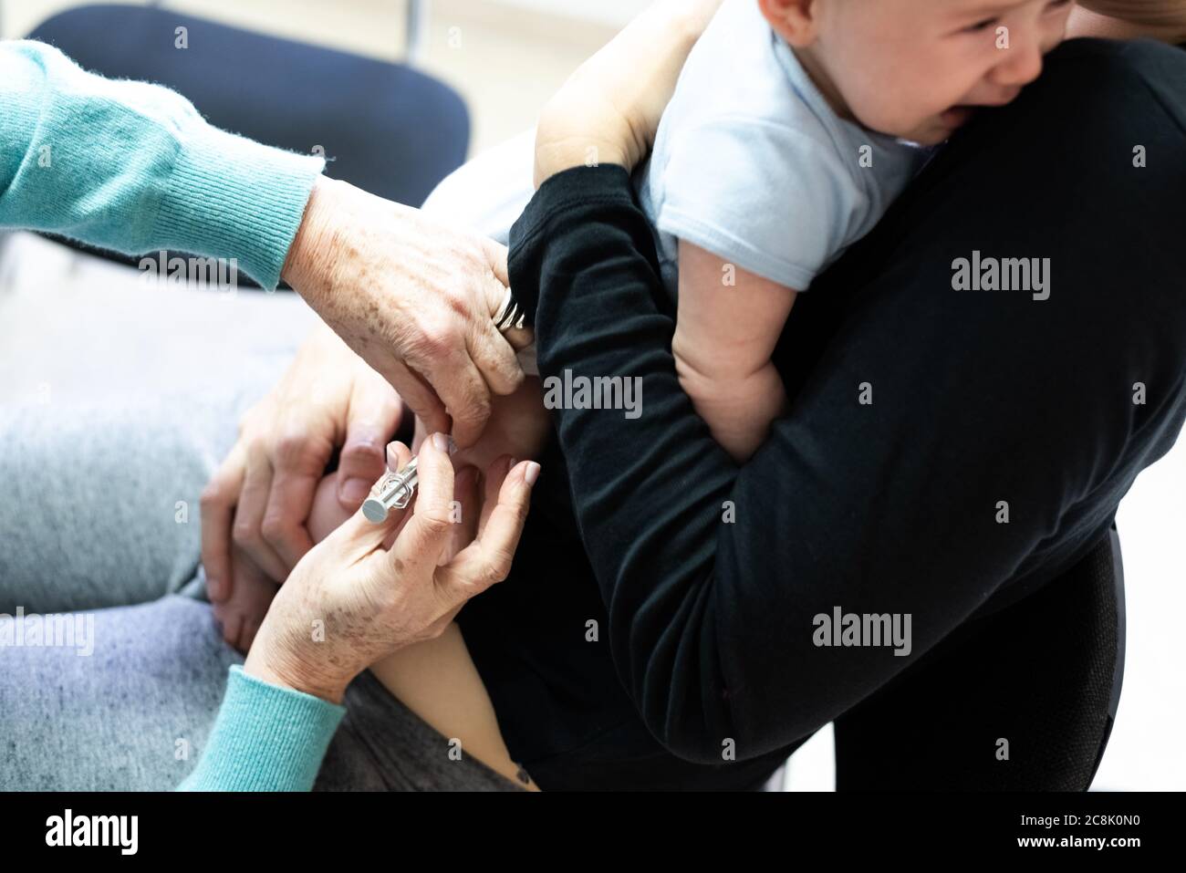 Baby intramuscular injection hi-res stock photography and images - Alamy