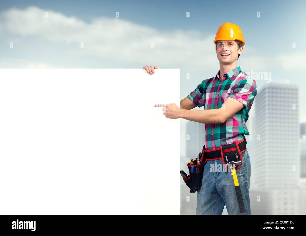 Repairman demonstrating banner Stock Photo - Alamy