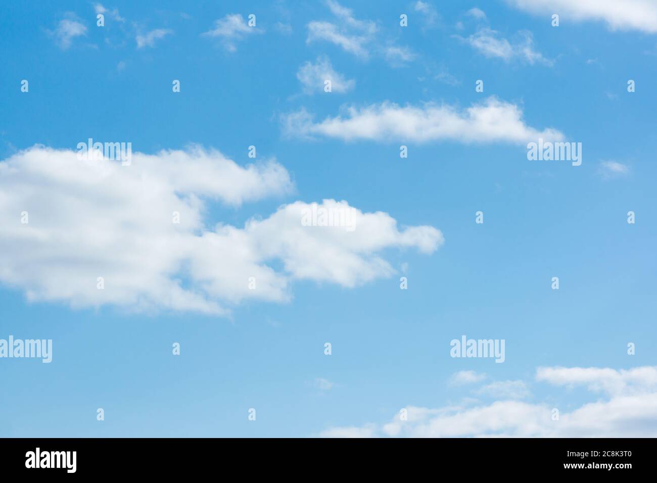 blue sky with flying white light clouds Stock Photo - Alamy