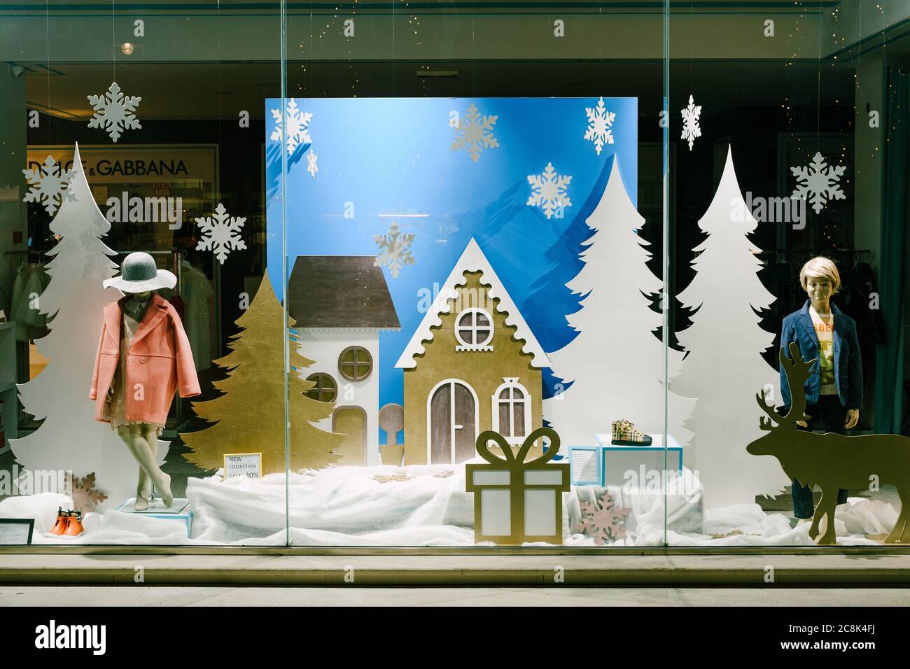 Decorating a Christmas showcase for the Dolce Gabbana brand, clothing ...