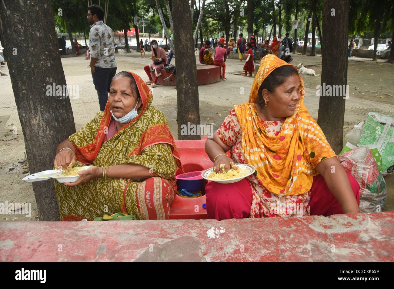 Happy Homeless People Eating