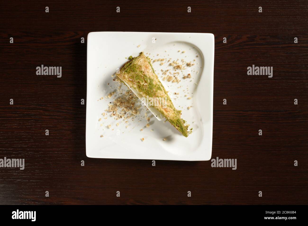 Turkish puff baklava with ice cream honey with pistachios triangular ...