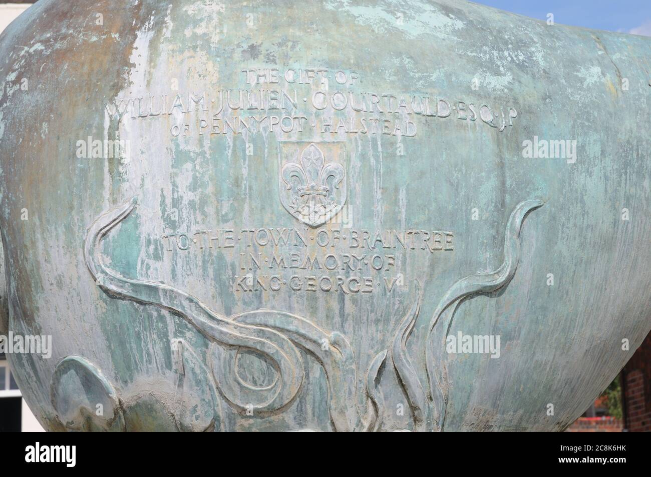 Statue of young boy hoding fish, Braintree, Essex Stock Photo - Alamy