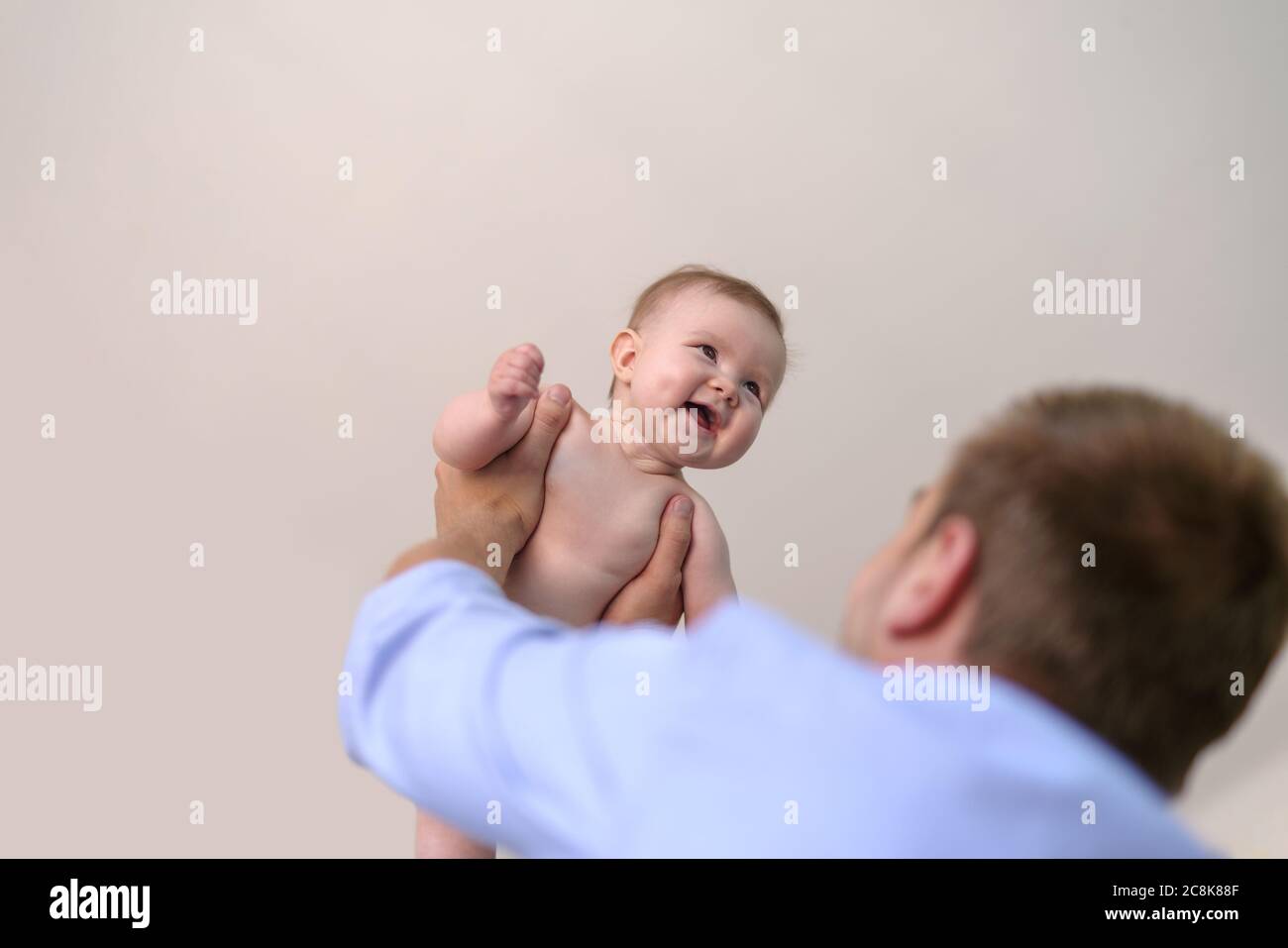 Holding aloft hi-res stock photography and images - Alamy