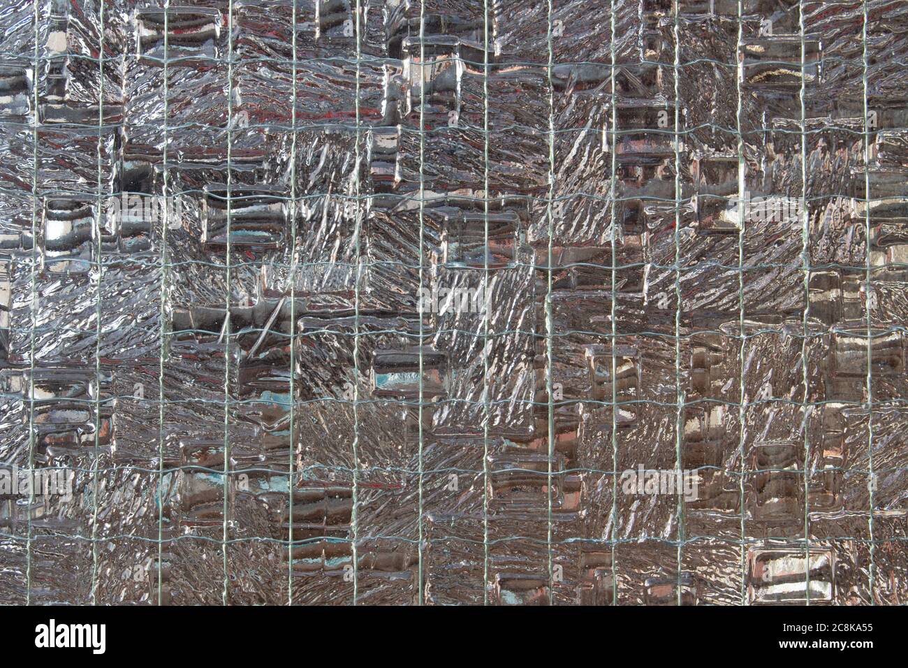 Reinforced wired safety glass background Stock Photo - Alamy