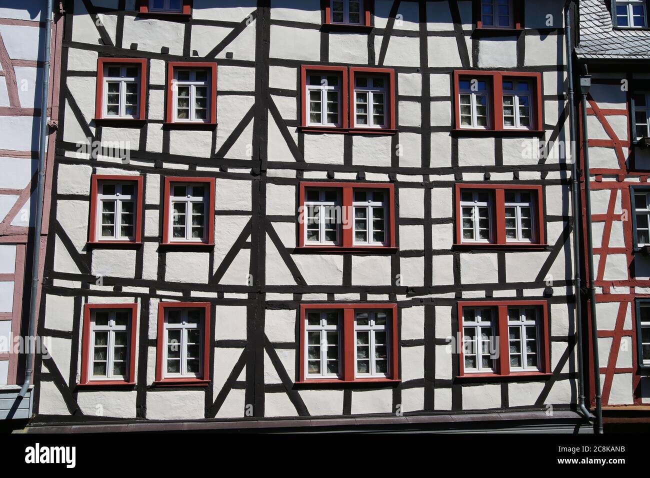 View on isolated skew facade of timber frame monument house with ...