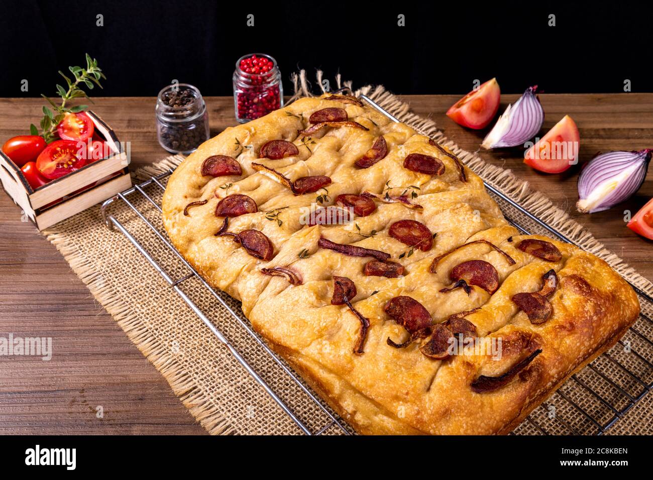 Traditional Italian Focaccia with pepperoni, cherry tomatoes, black ...
