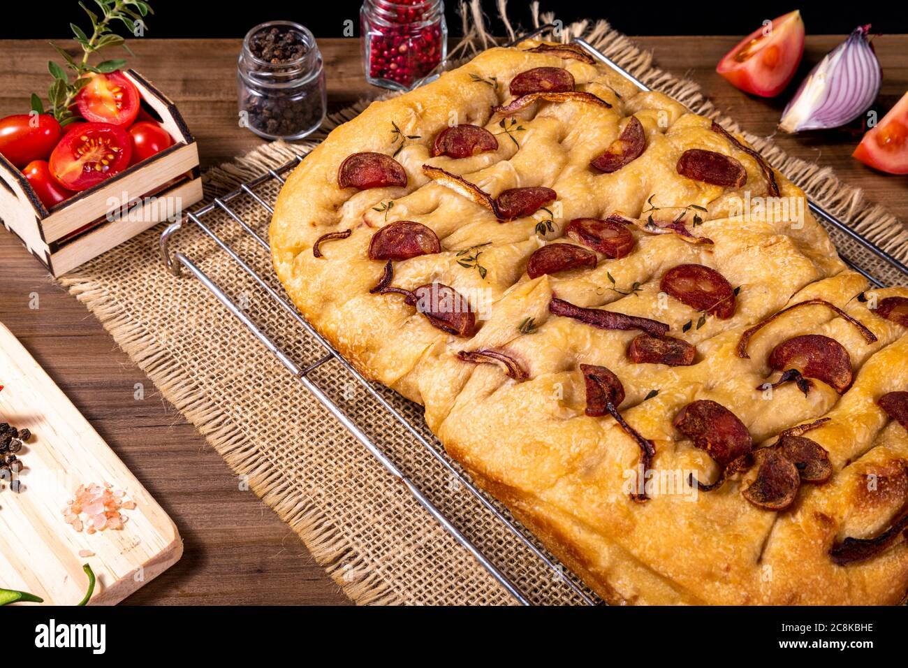 Traditional Italian Focaccia with pepperoni, cherry tomatoes, black ...