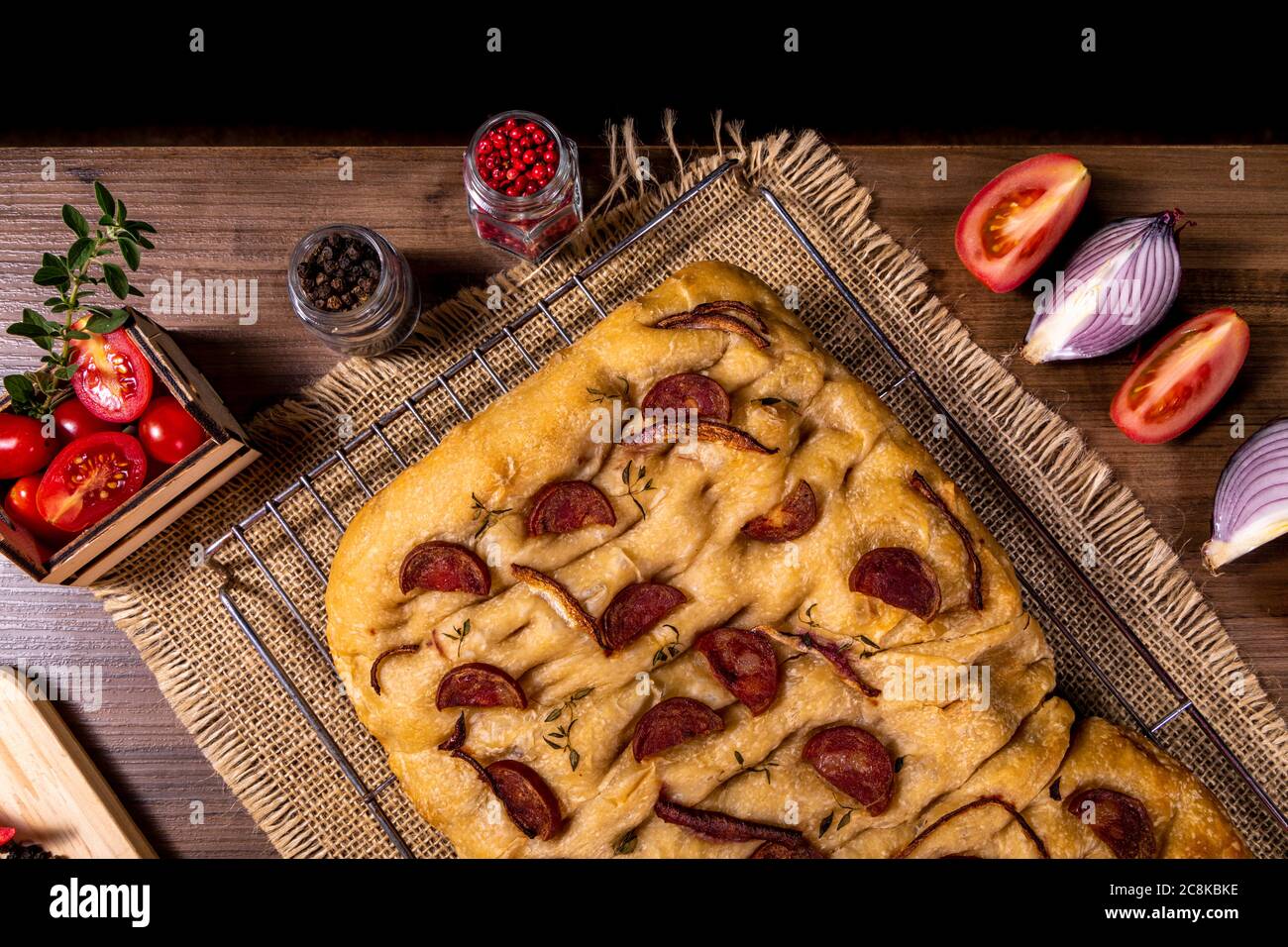 Traditional Italian Focaccia with pepperoni, cherry tomatoes, black ...