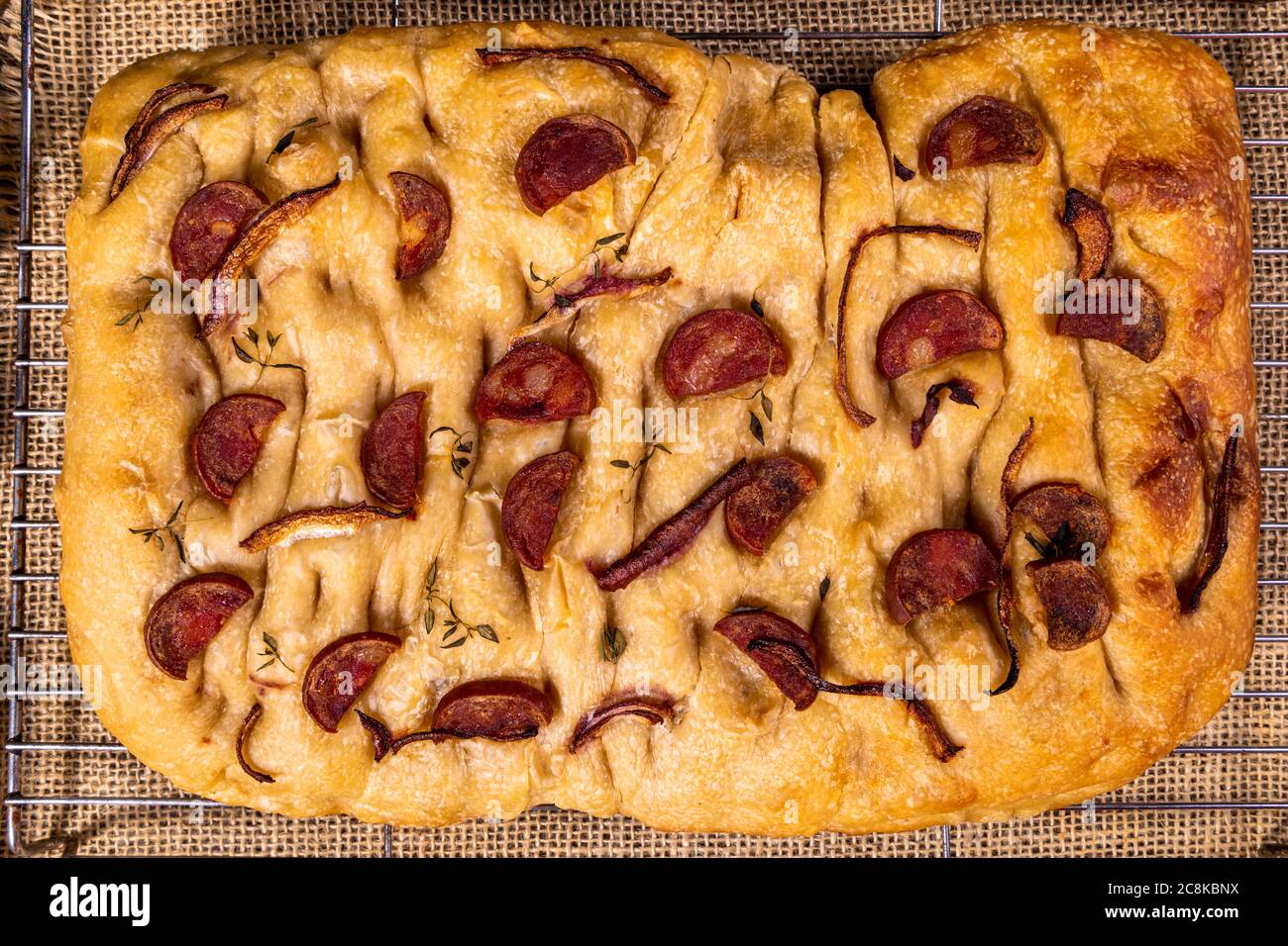 Traditional Italian Focaccia with pepperoni, cherry tomatoes, black ...