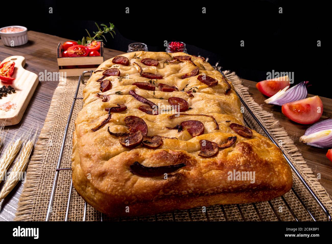 Traditional Italian Focaccia with pepperoni, cherry tomatoes, black ...