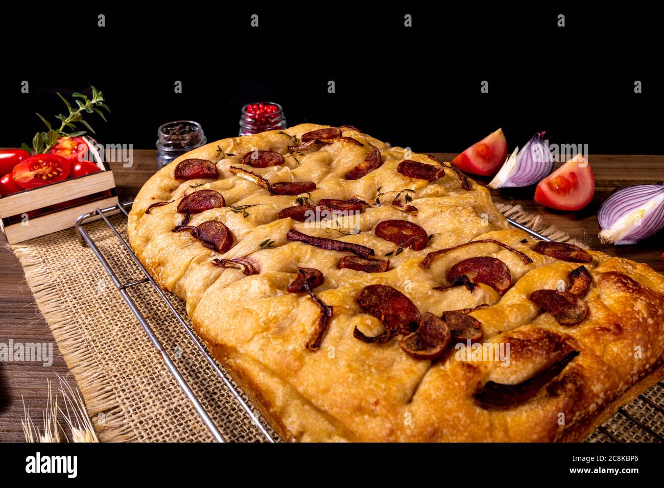 Traditional Italian Focaccia with pepperoni, cherry tomatoes, black ...