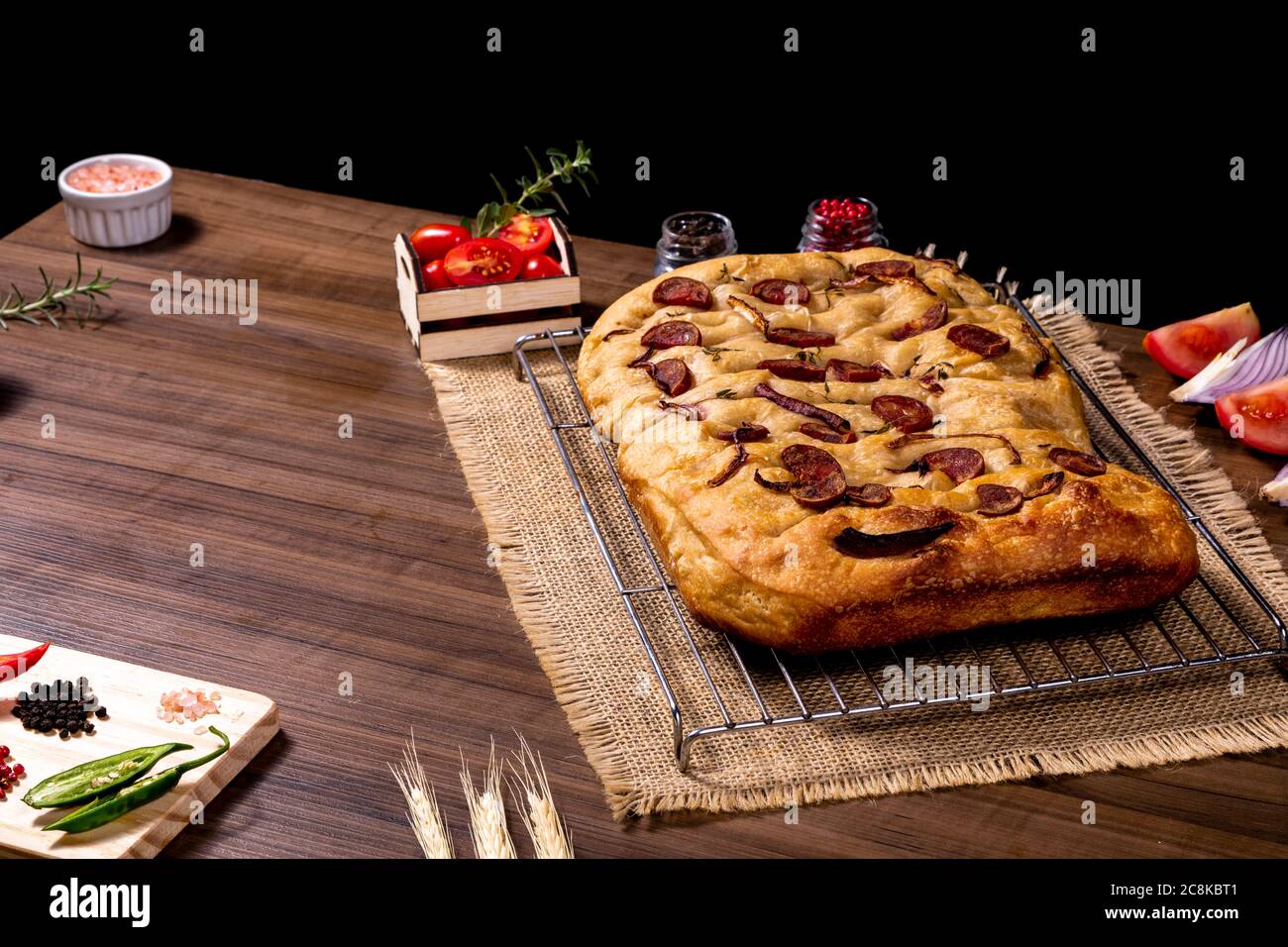 Traditional Italian Focaccia with pepperoni, cherry tomatoes, black ...