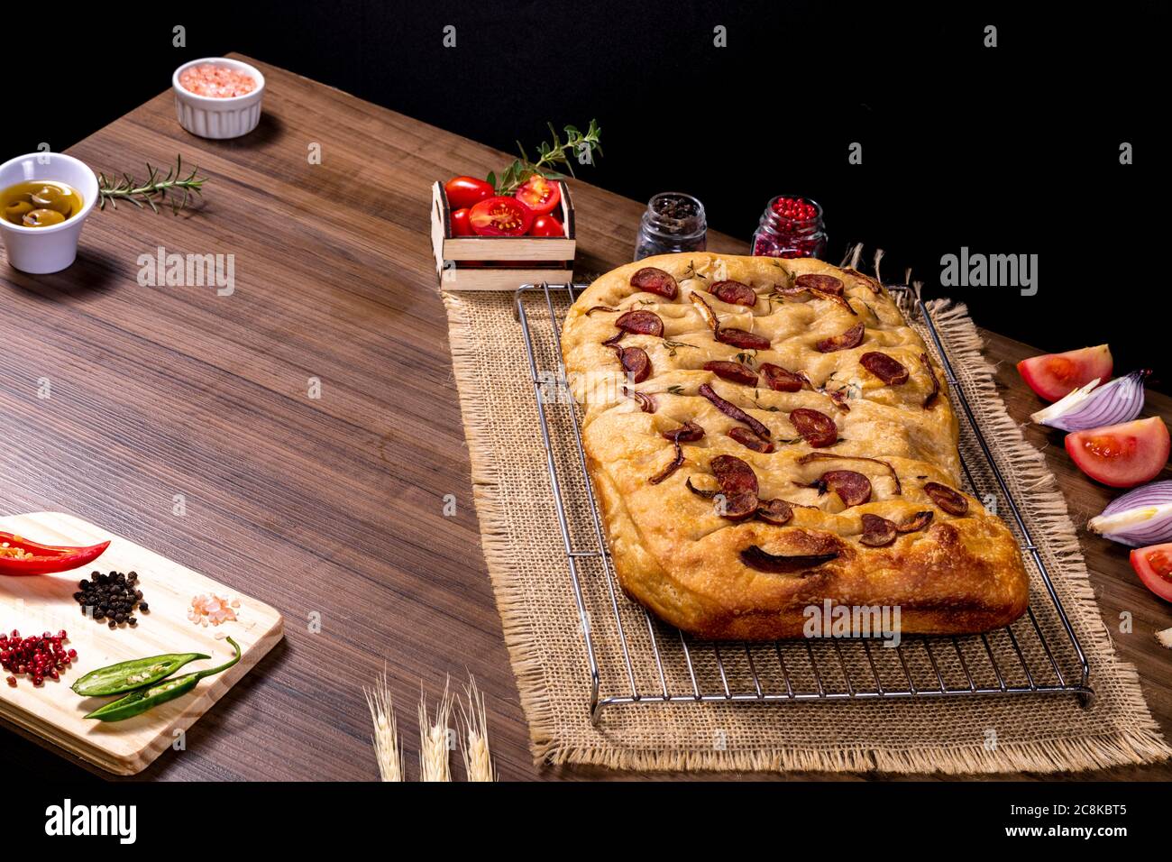 Traditional Italian Focaccia with pepperoni, cherry tomatoes, black ...