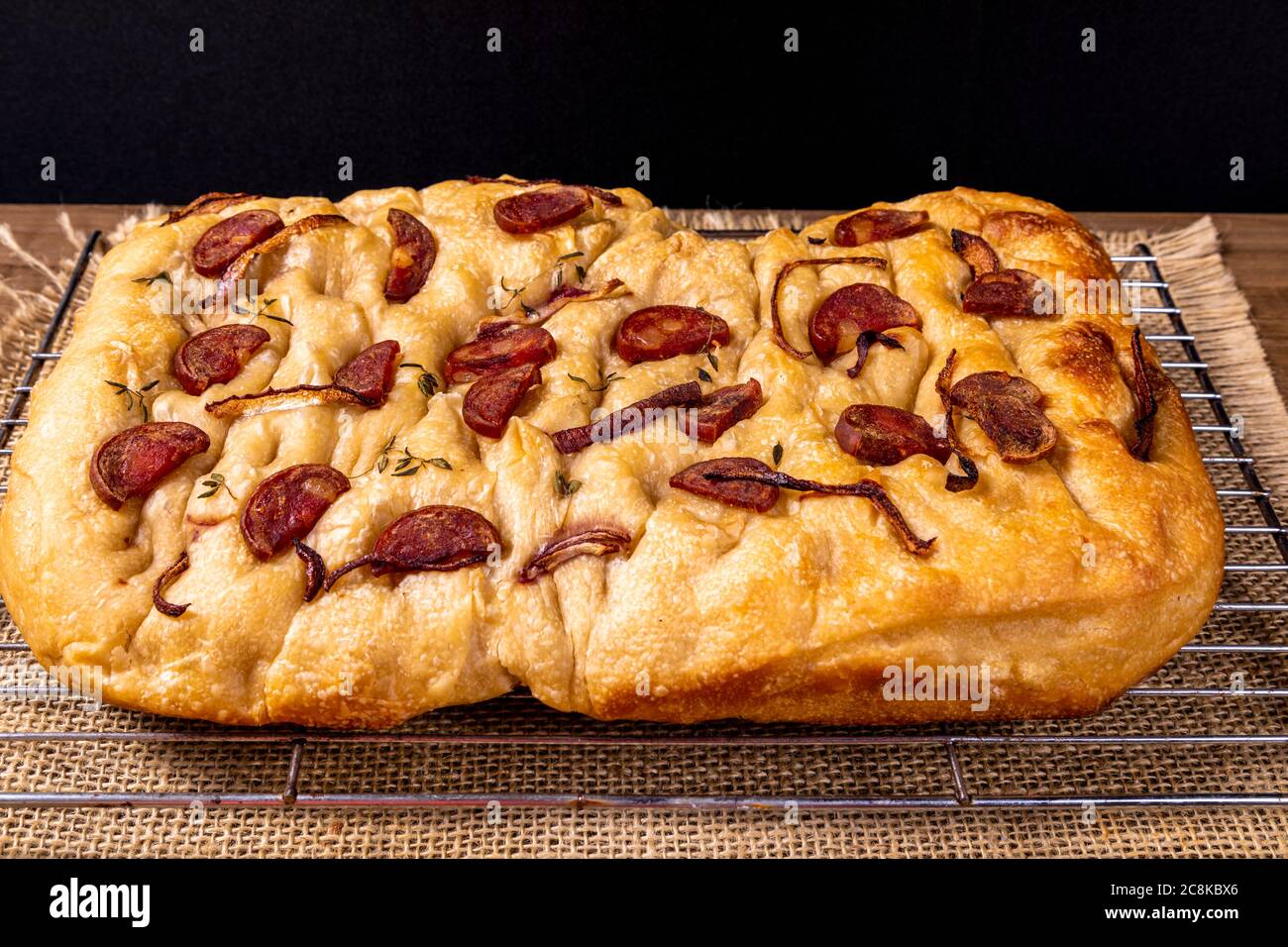Traditional Italian Focaccia with pepperoni, cherry tomatoes, black ...