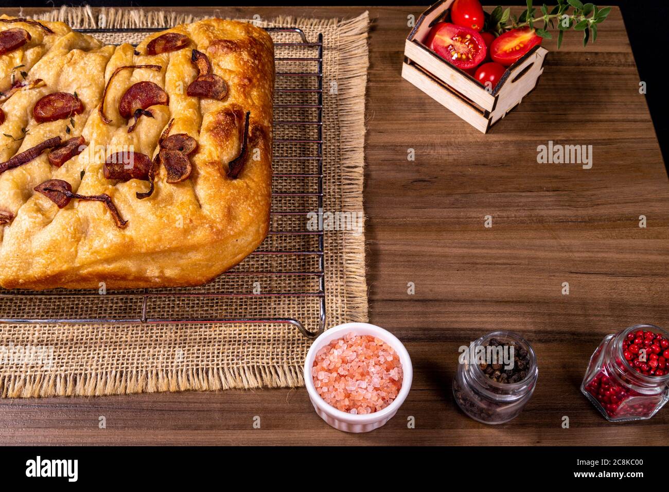 Traditional Italian Focaccia with pepperoni, cherry tomatoes, black ...