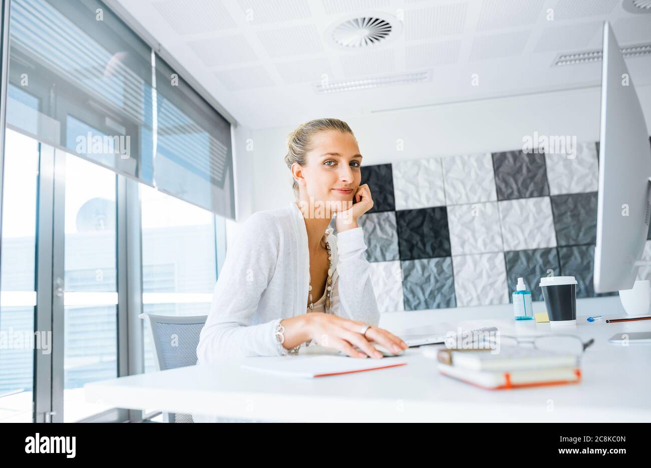 Elegant office worker Stock Photo - Alamy