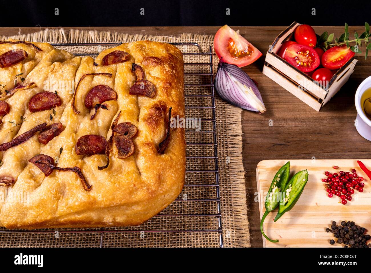 Traditional Italian Focaccia with pepperoni, cherry tomatoes, black ...