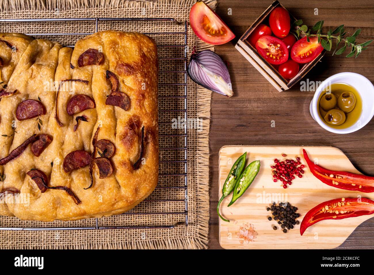 Traditional Italian Focaccia with pepperoni, cherry tomatoes, black ...