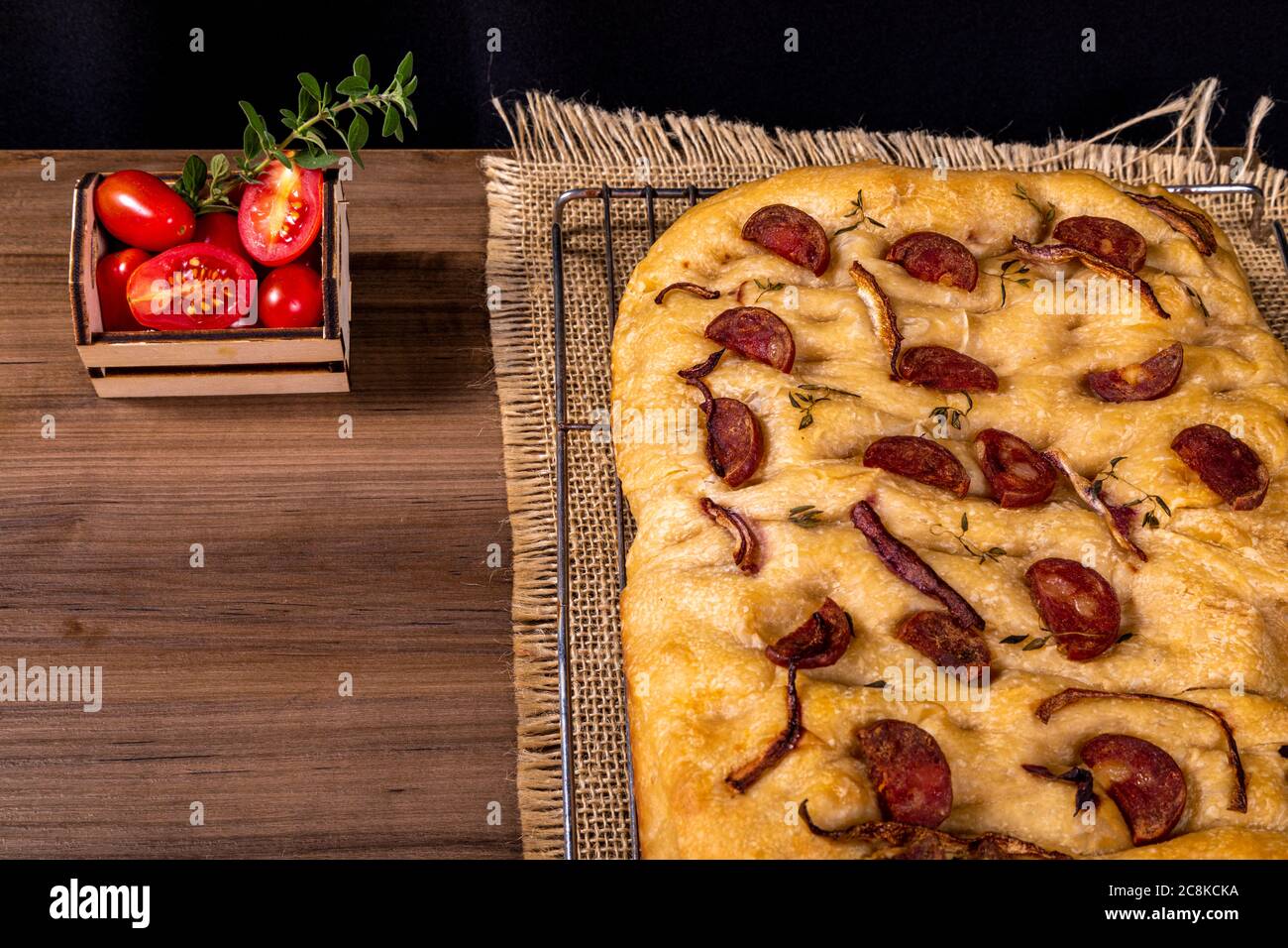 Traditional Italian Focaccia with pepperoni, cherry tomatoes, black ...
