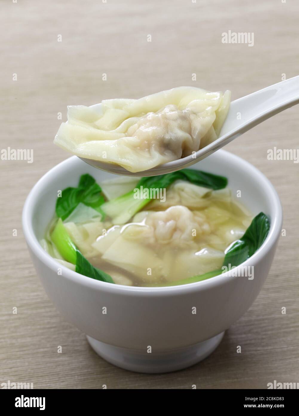 homemade wonton soup with bok choy, chinese dim sum dish Stock Photo ...