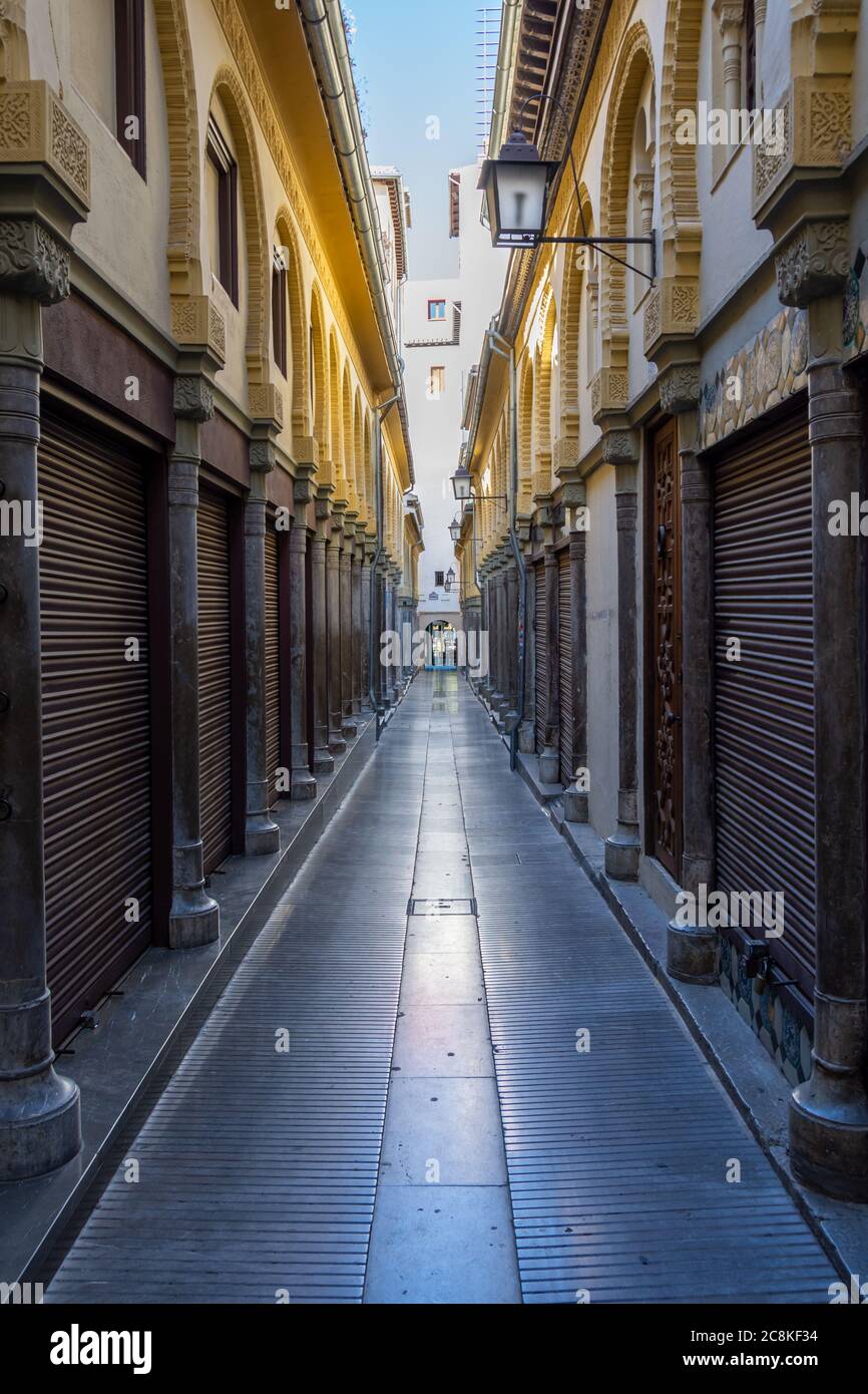 Perspective of the empty Ermita street in the Alcaiceria de Granada ...