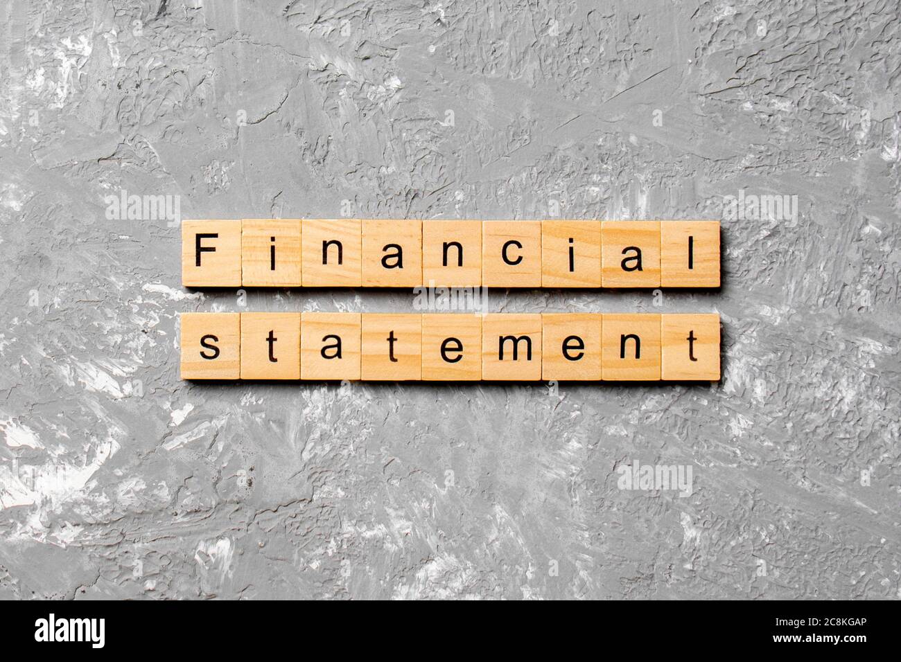 Financial statement word written on wood block. Financial statement ...