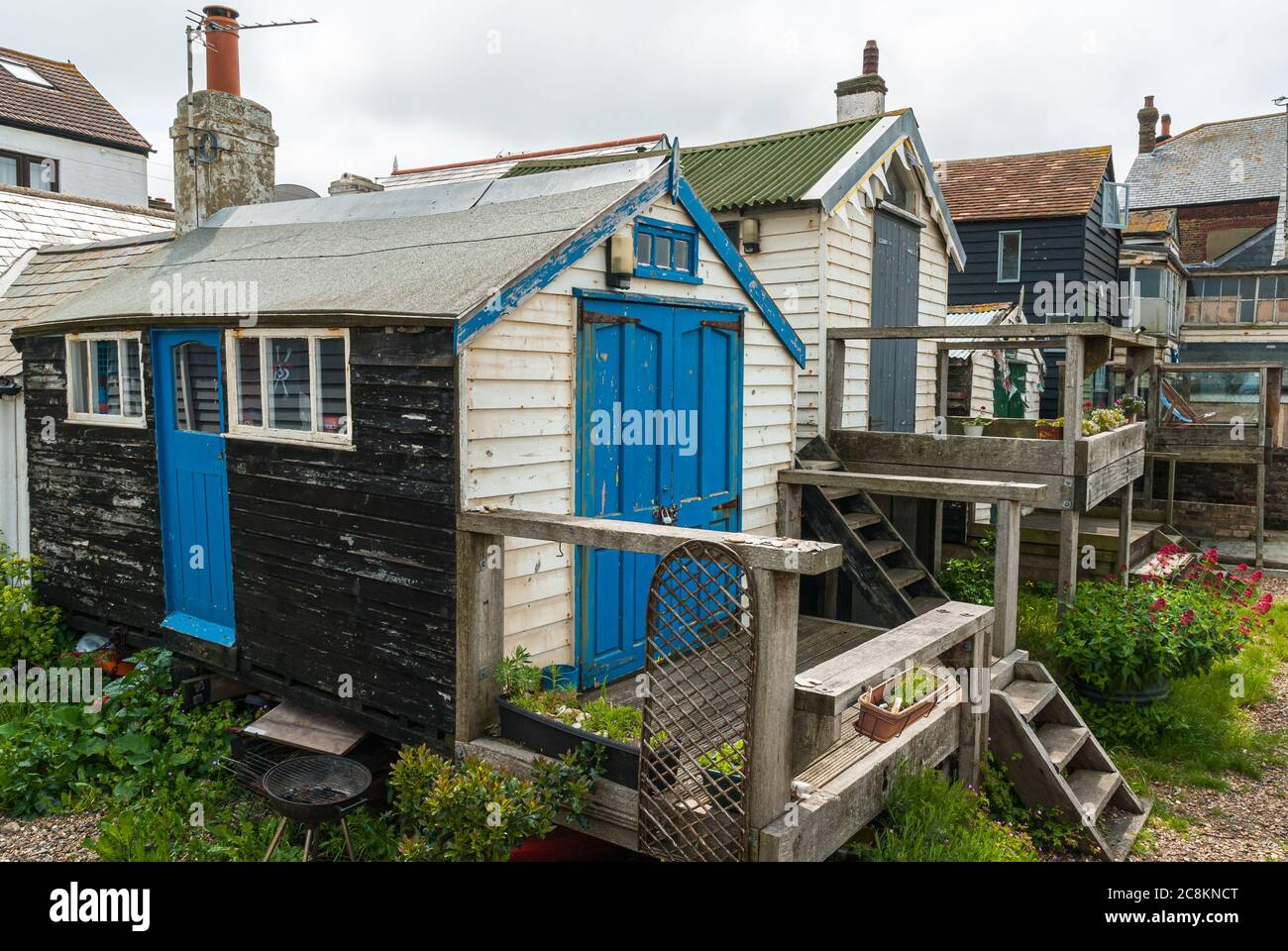 Old fishermans huts at the rear of houses in Whitstable, Kent Stock ...