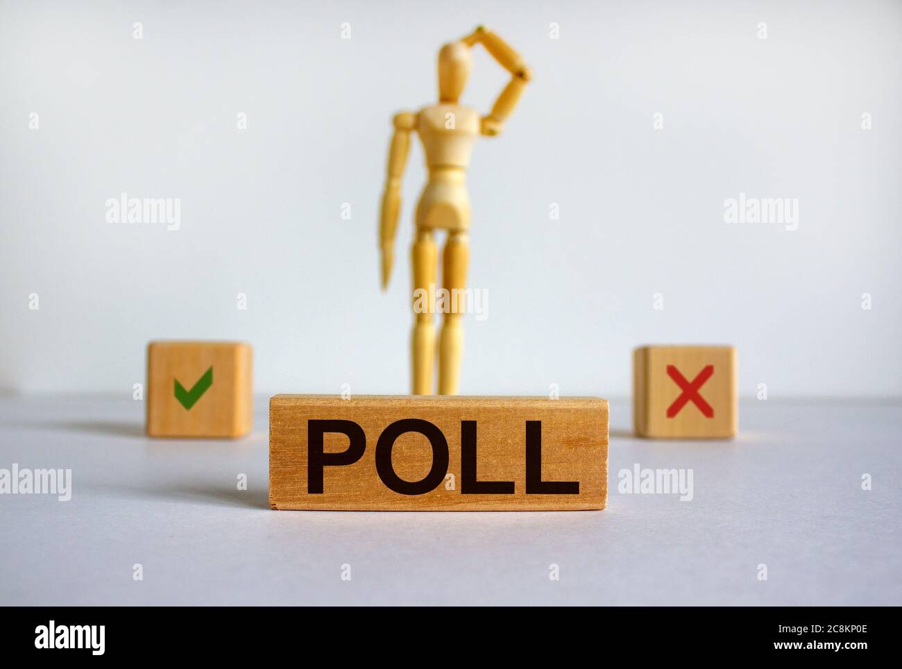 'Poll' word written in wooden block. Wooden model of a man reflecting ...