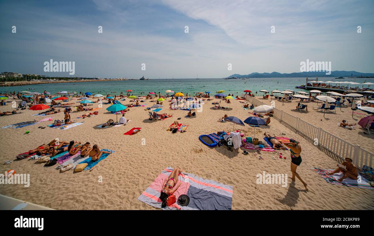 The famous beach of Cannes at the Croisette in summer - CITY OF CANNES ...