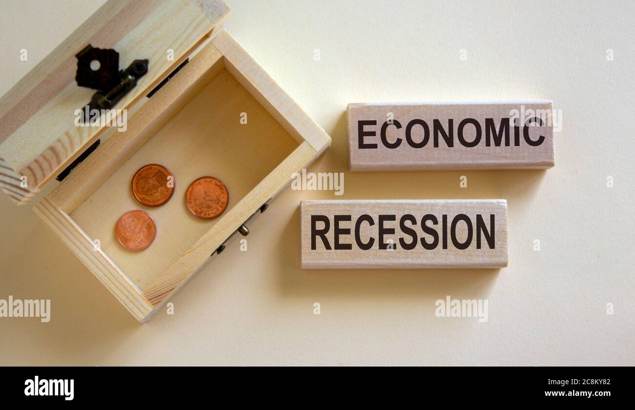 Concept words 'economic recession' on blocks on a beautiful white ...