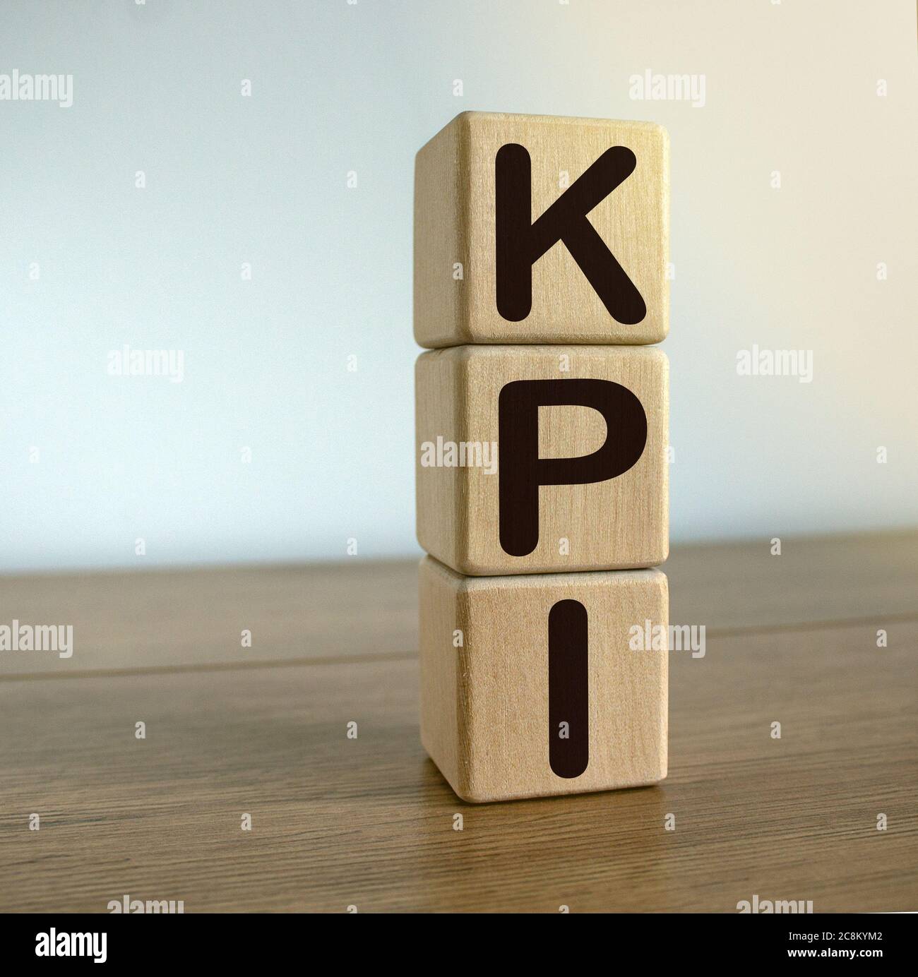 concept word KPI on cubes on a beautiful wooden table Stock Photo - Alamy