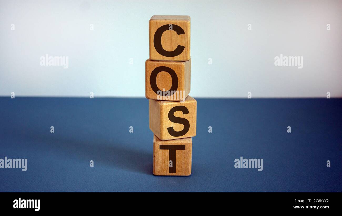 Concept word 'cost' on cubes on a beautiful blue background. Business ...
