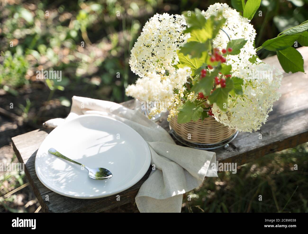 Breakfast is served in the garden in a rustic style Stock Photo - Alamy