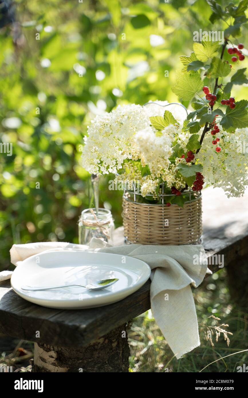Breakfast is served in the garden in a rustic style Stock Photo - Alamy