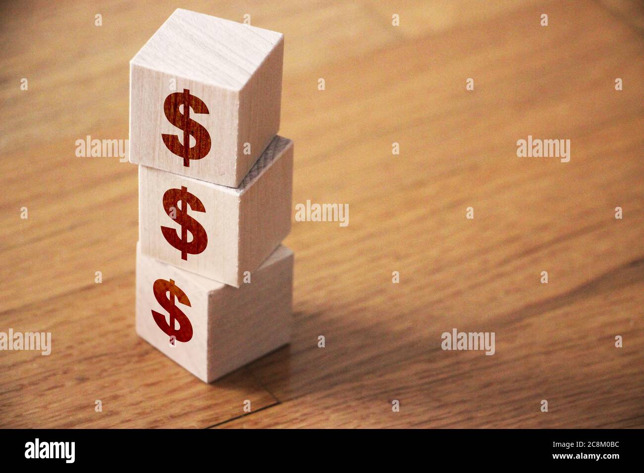 Wooden blocks with dollar sign. Financial concept Stock Photo - Alamy