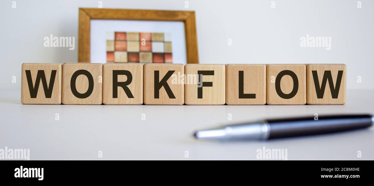 Concept word 'workflow' on cubes on a beautiful white background. Photo ...