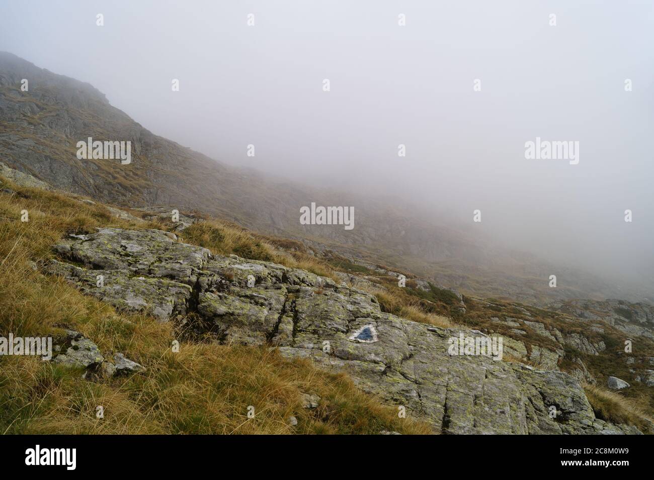 Scenic mountain view with misty weather Stock Photo - Alamy