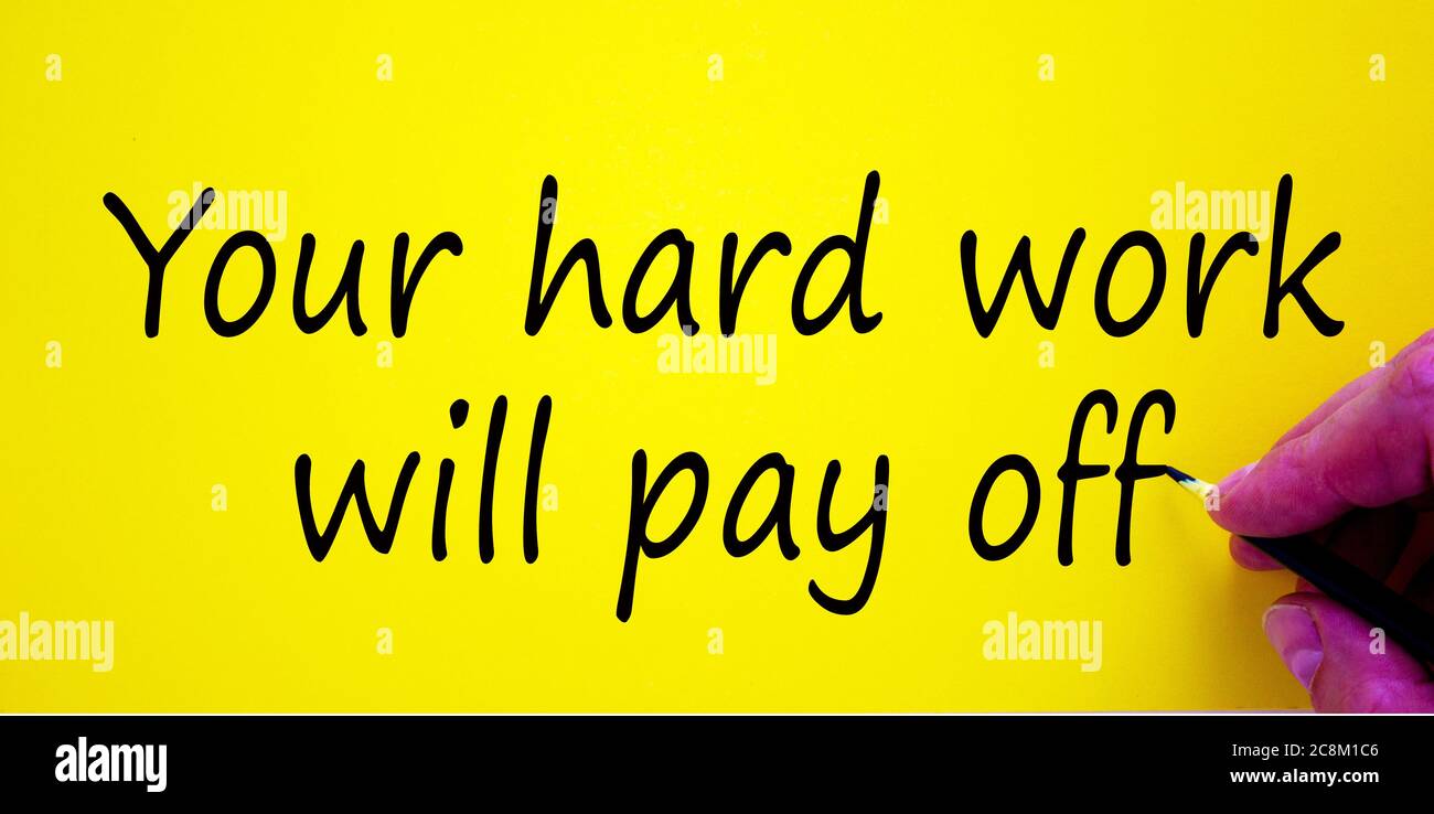 Hand writing 'your hard work will pay off', isolated on beautiful ...