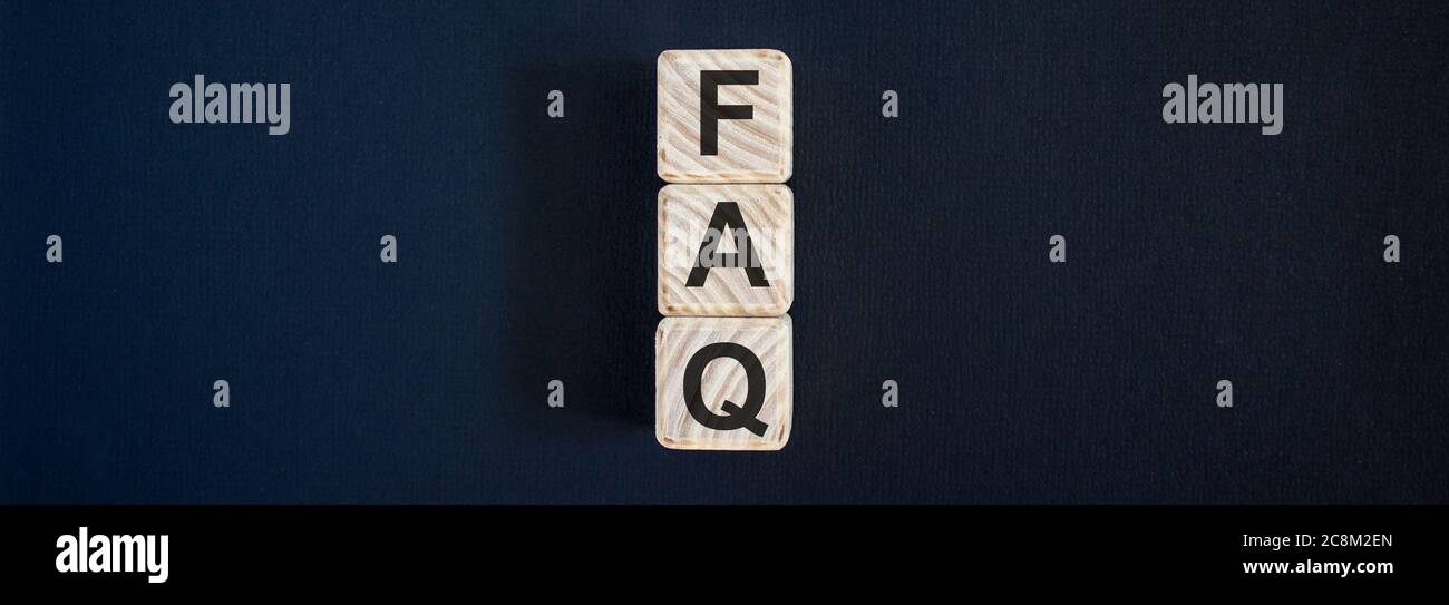 FAQ sign over dark blue background Stock Photo - Alamy