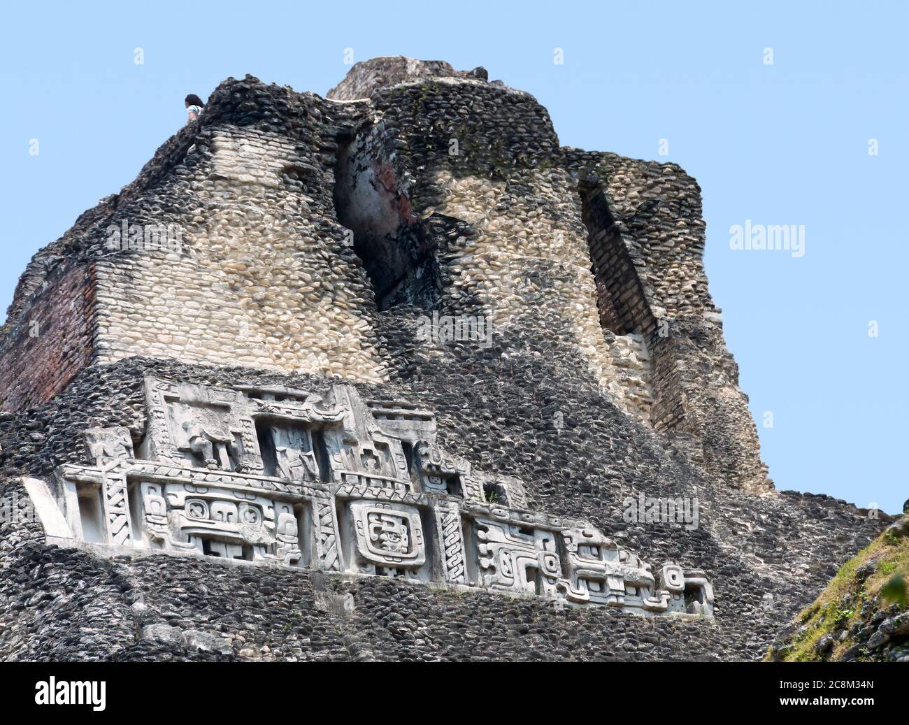 Xunantunich, Belize - May 14, 2011: Mayan carvings on the peak of the ...