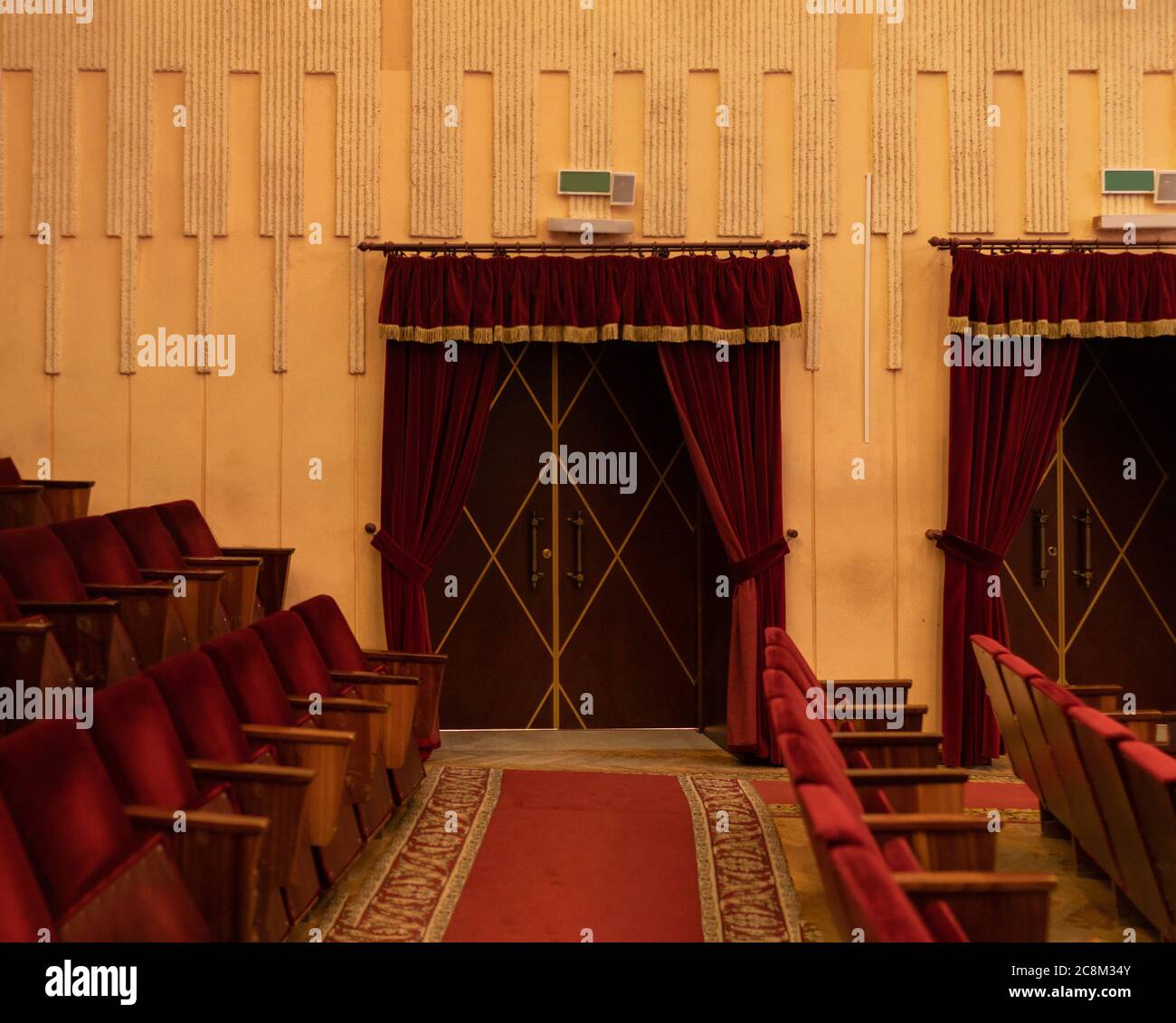 Wooden doors and velvet curtains in the theater hall Stock Photo - Alamy