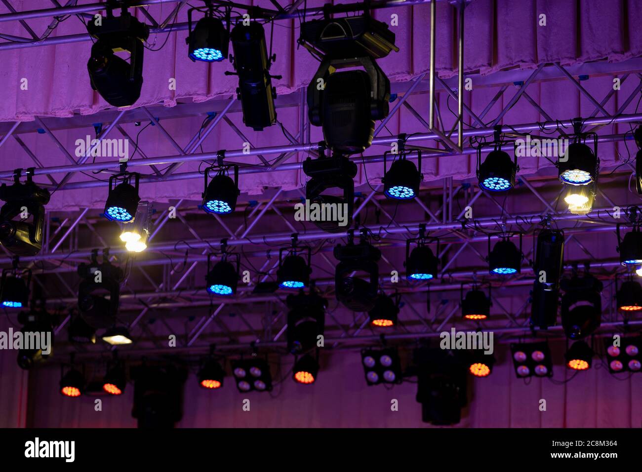 Lighting and spotlights, stage light in a theater above the stage ...