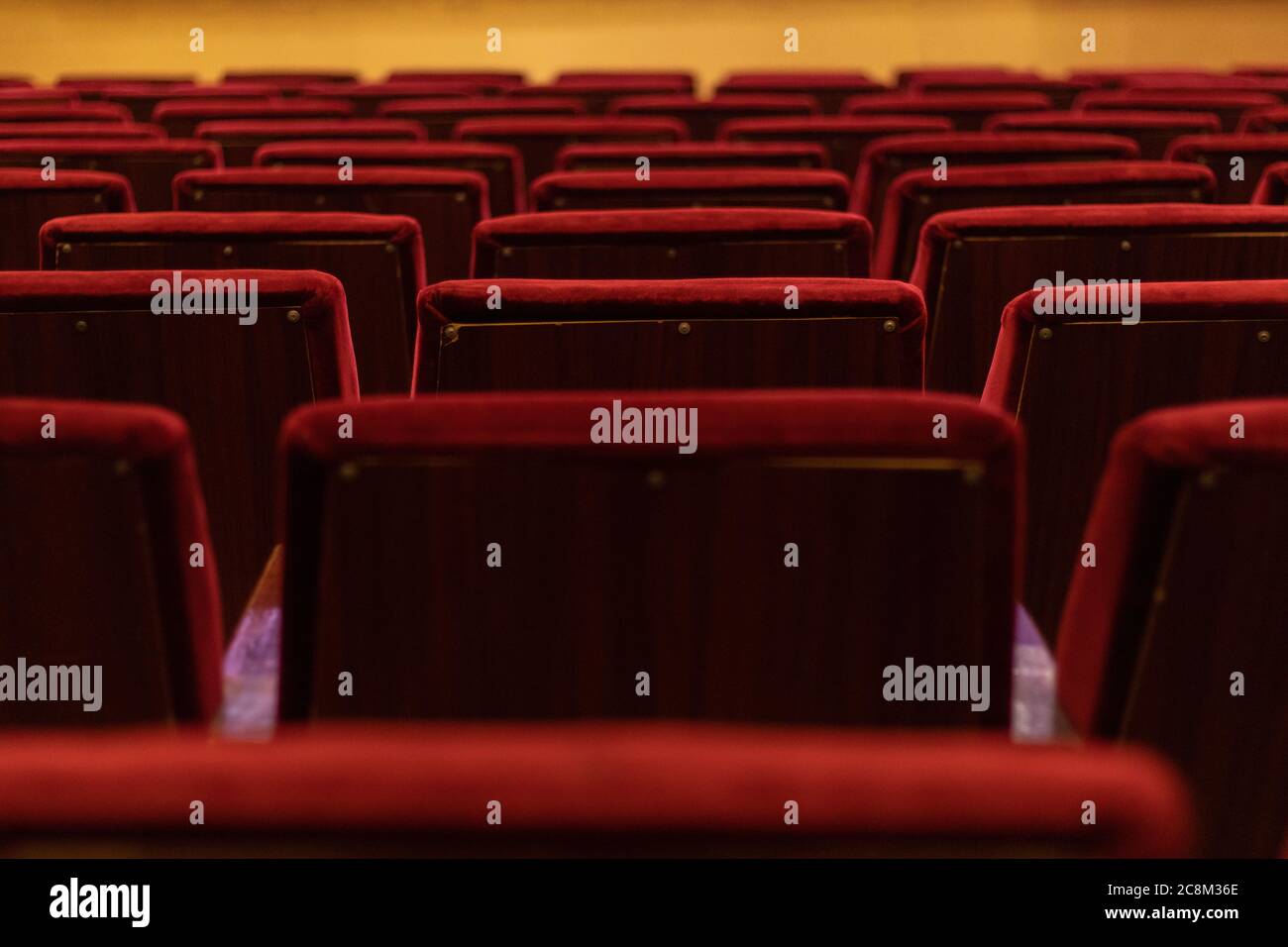 dark red soft velvet chairs in the theater hall Stock Photo - Alamy