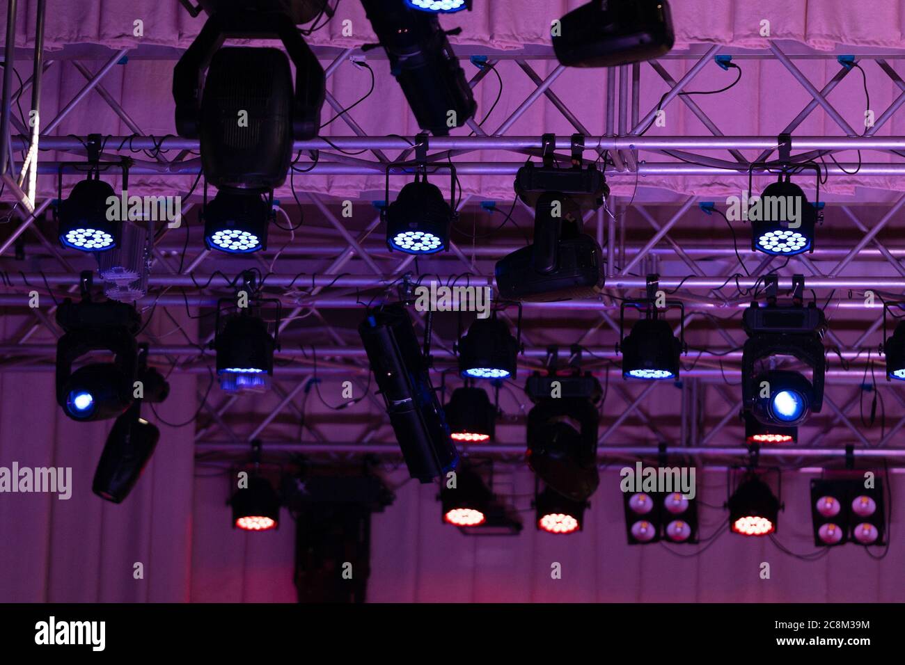 Lighting and spotlights, stage light in a theater above the stage ...