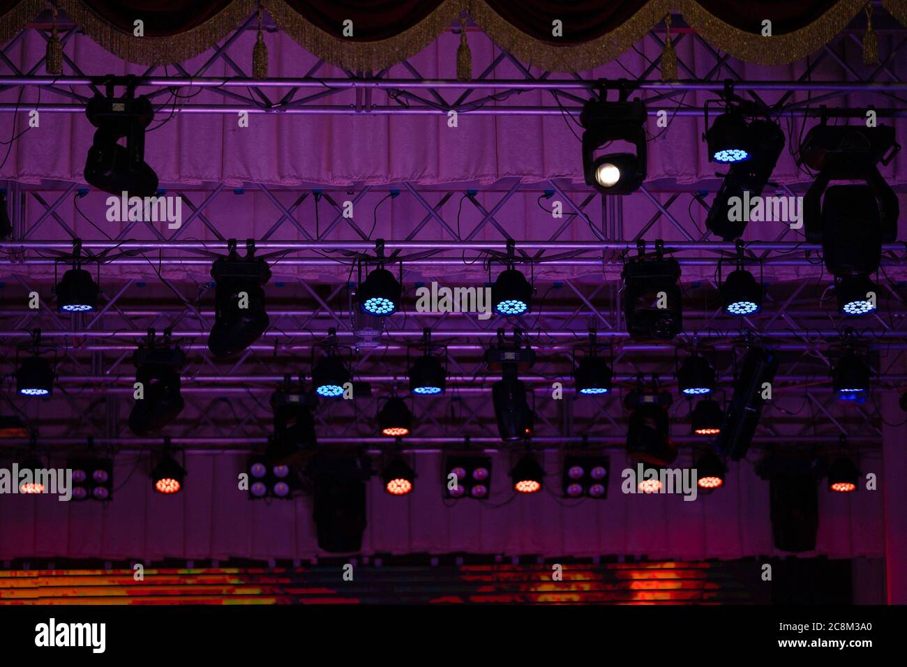 Lighting and spotlights, stage light in a theater above the stage ...