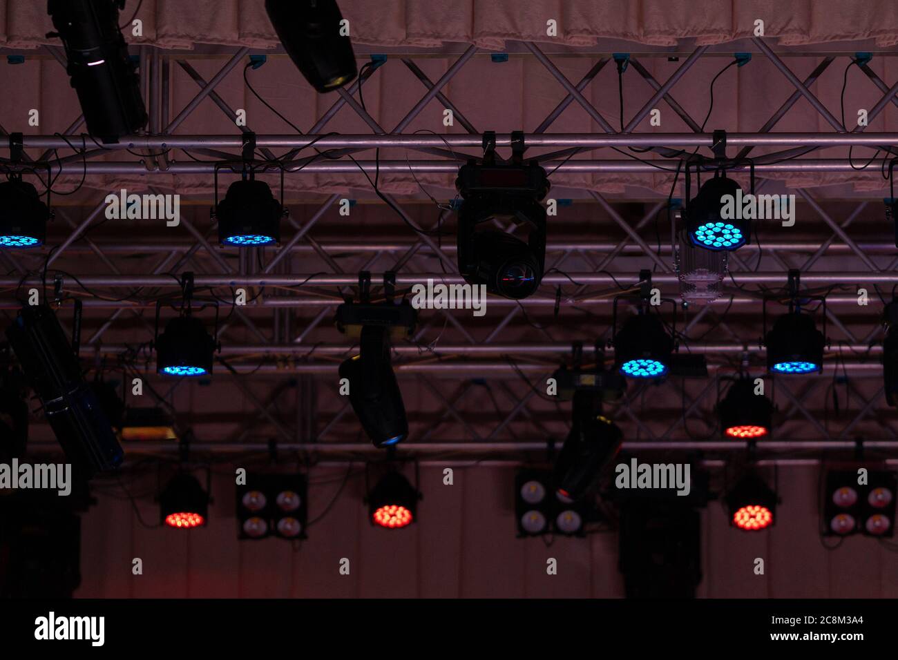 Lighting and spotlights, stage light in a theater above the stage ...